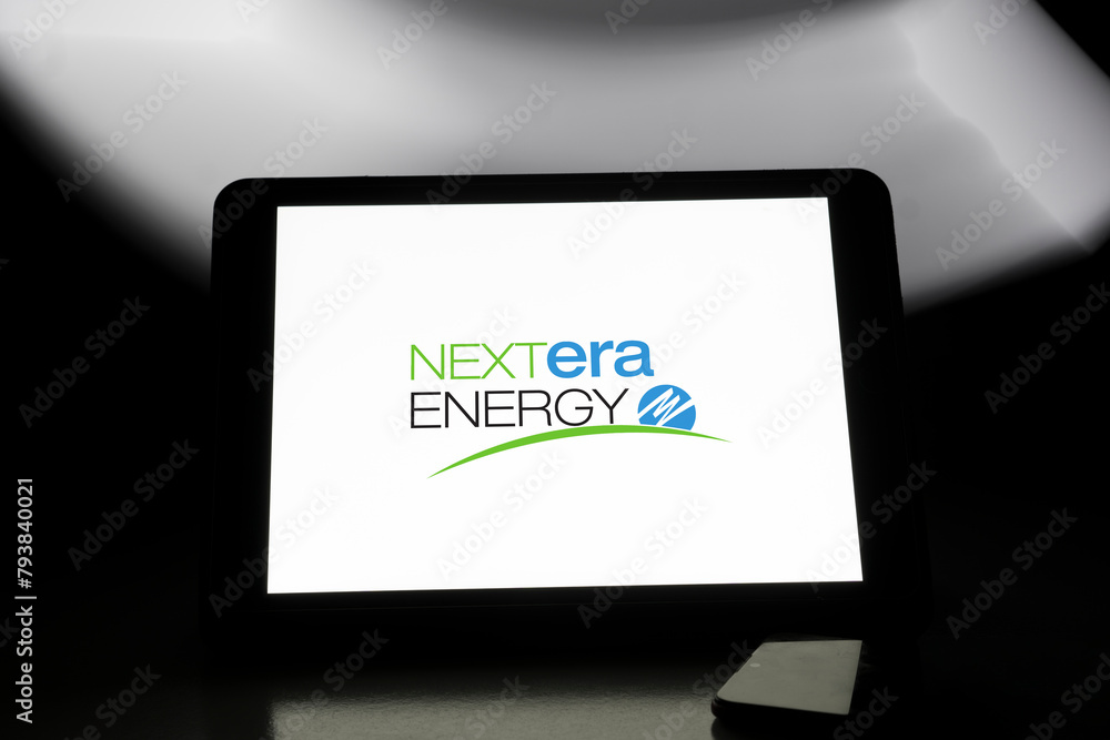 Dhaka, Bangladesh- 24 Apr 2024: NextEra Energy logo is displayed on ipad. Stock Photo | Adobe Stock