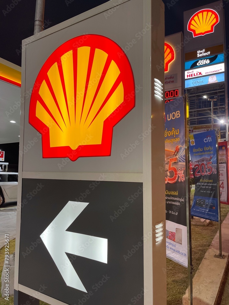 Shell fuel station. Night view. Bright light box with logo of famous ...