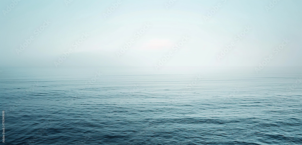 A panoramic view of a calm sea, the intensity of the ocean's blue ...