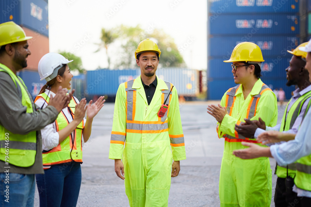 Coworkers clapping hands to engineer or worker for success work or ...