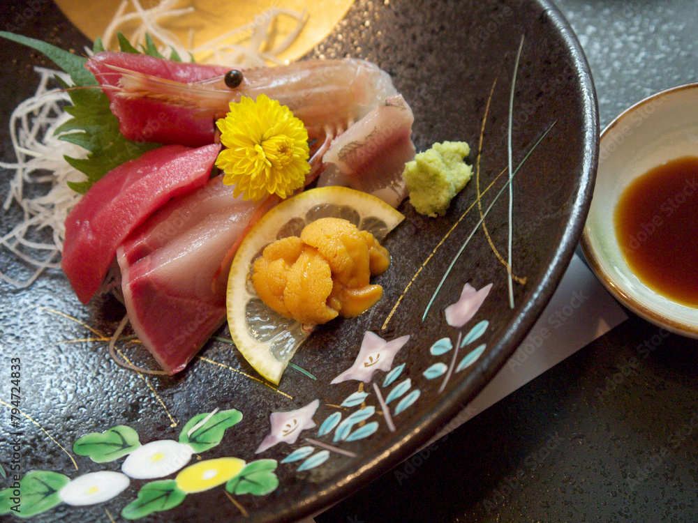 Luxury Japanese sashimi with tuna, ebi shrimp, hamachi amberjack fish ...