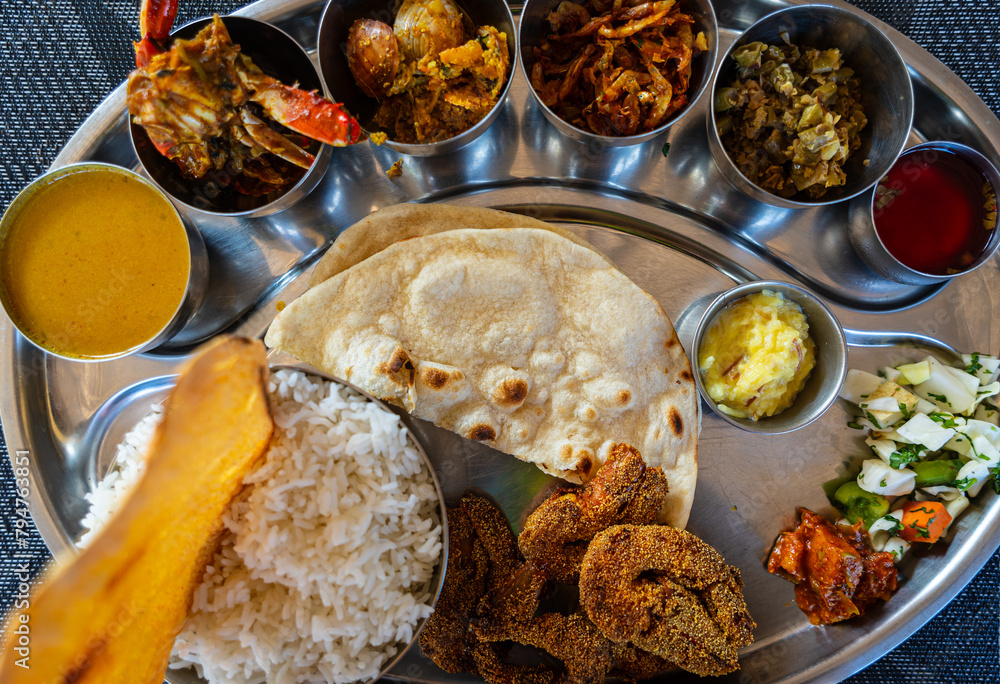 Goan Fish Thali Served with Papad and Chapati, Rawa Fried Fish, Sol ...