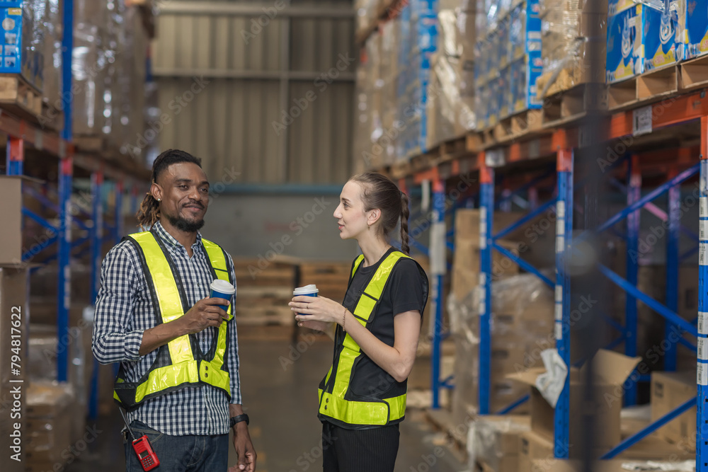 Happy worker having a coffee break in Warehouse. Warehouse worker ...
