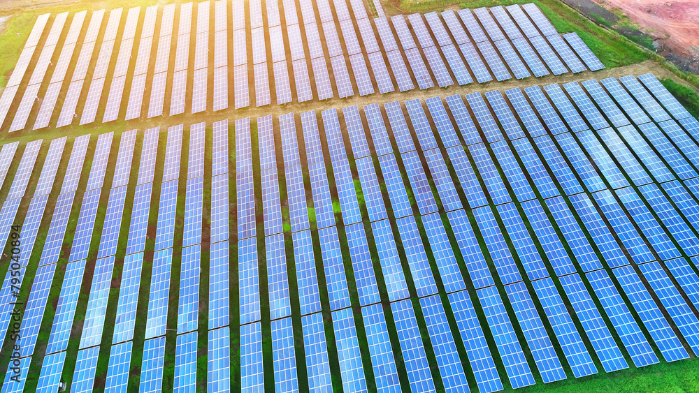 A solar power plant employs photovoltaic cells to convert sunlight into ...