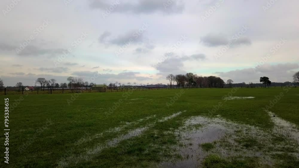 The sequence of clips showcases the vastness of saturated fields under ...