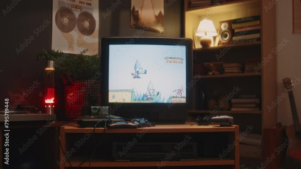 No people handheld footage of tube TV with old arcade video game with ...