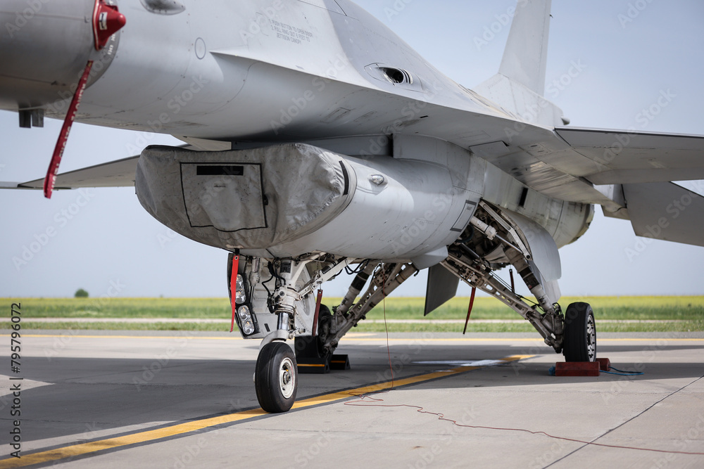 Fighter aircraft in parking position. Detail with landing gear. Stock ...