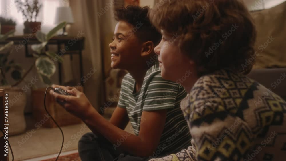 Vidéo Stock Side tilt handheld footage of diverse gen Y boys laughing ...