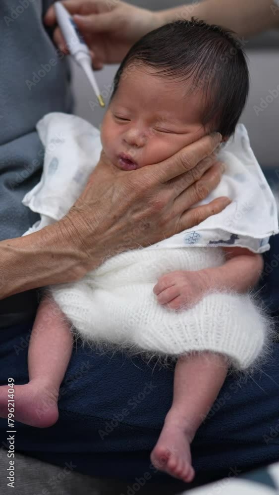 A Taiwanese grandmother in her 70s and a mother in her 30s are wearing ...