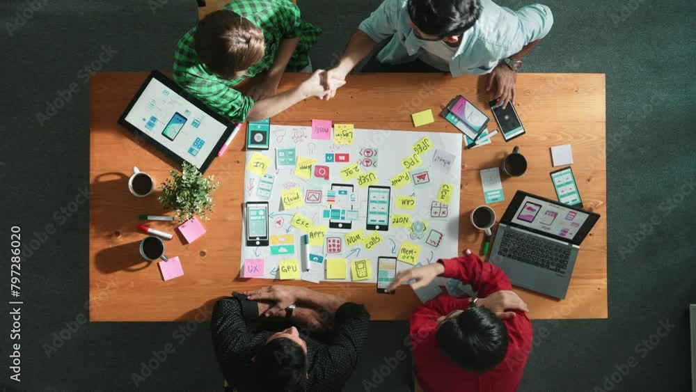 Professional developer team sharing idea of Ux Ui design by using mind map. Top down view of ...