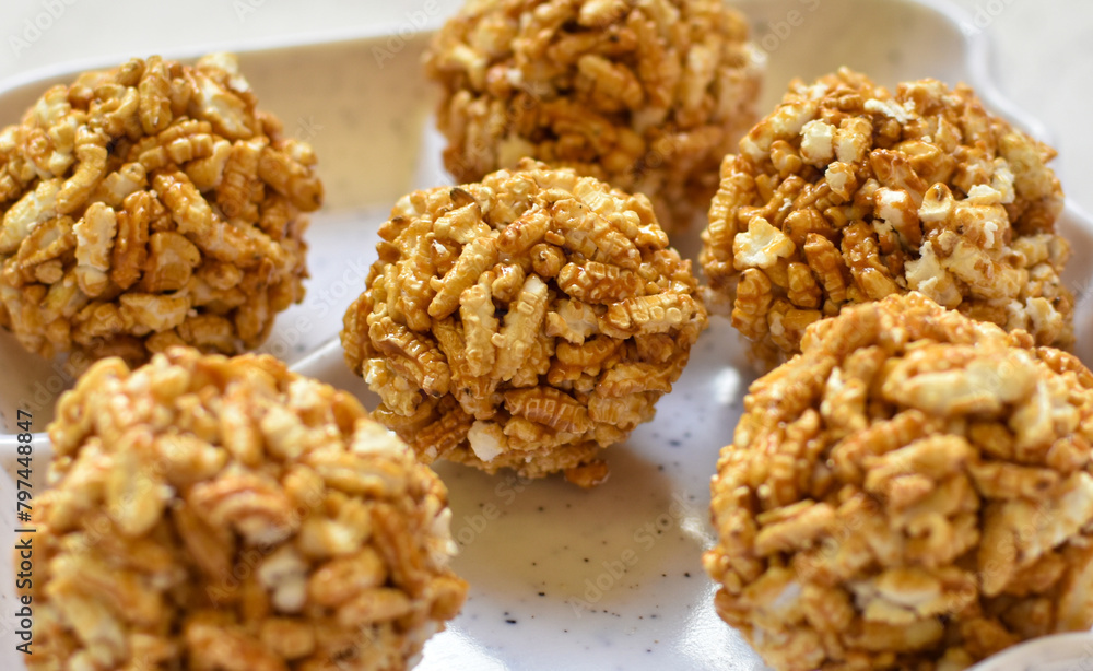 flakes with milk. Closeup view of Traditional Puffed Rice Balls is a ...