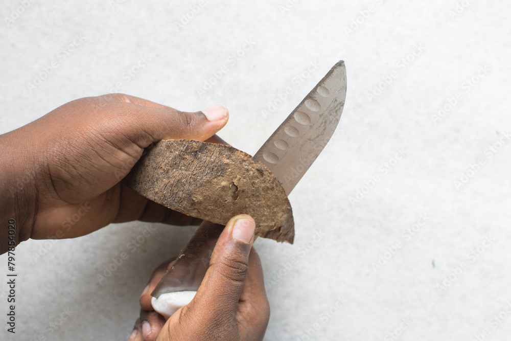 Female hands peeling yam, woman peeling nigerian white yam, how to peel ...