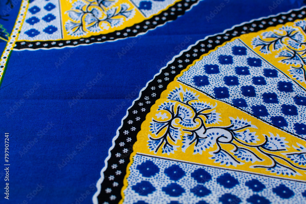 top view of blue and yellow ankara fabric, flatlay of nigerian wax ...