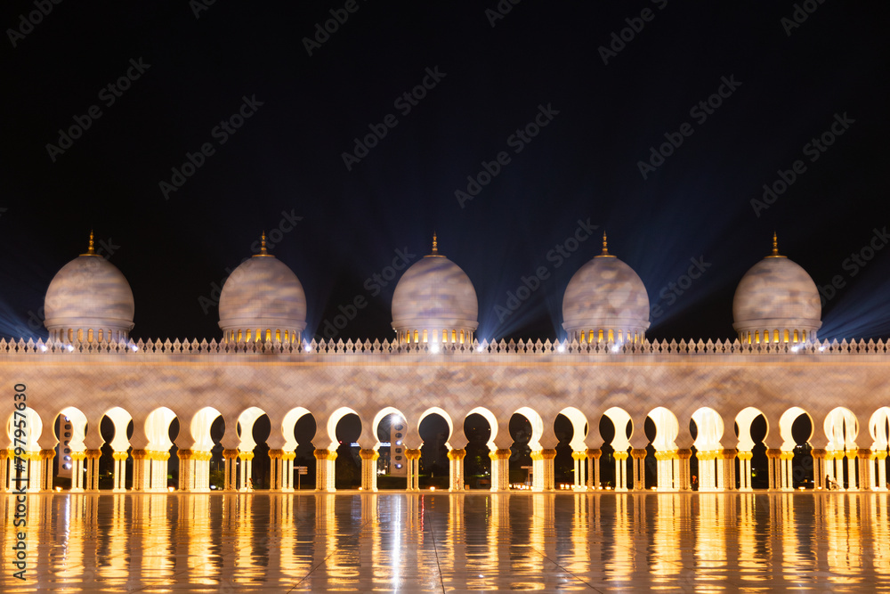 Sheikh Zayed Grand Mosque's domes and arches mirrored on polished ...