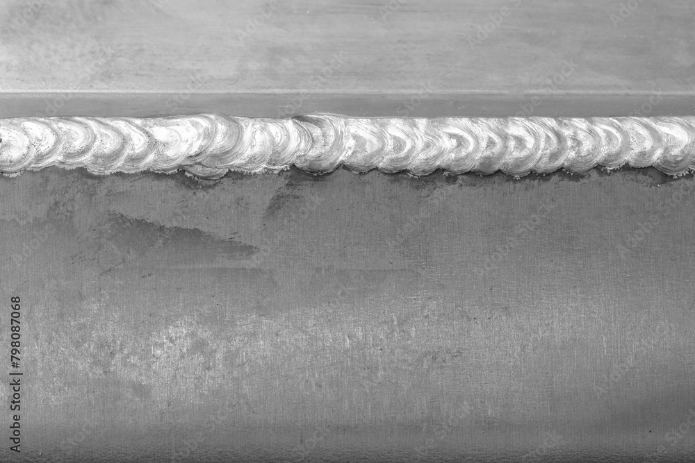 Welding steel beams completed in process shielded metal arc welding ...