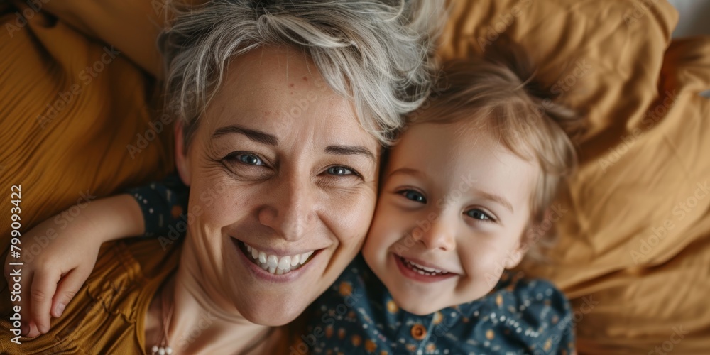 Smile, selfie, grandmother with child on bed bonding, rest, and love ...