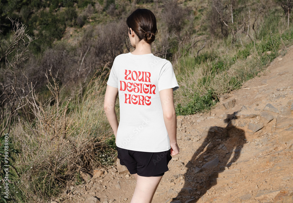 Mockup of woman wearing customized sports t-shirt, rear view Stock ...