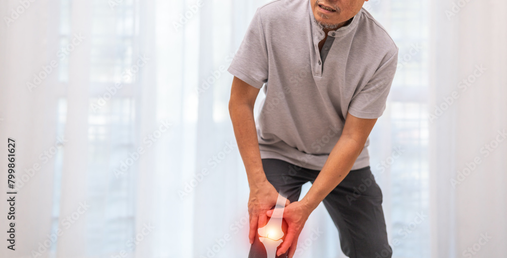 Sick unhappy senior adult elderly asian man touching her muscle injury ...