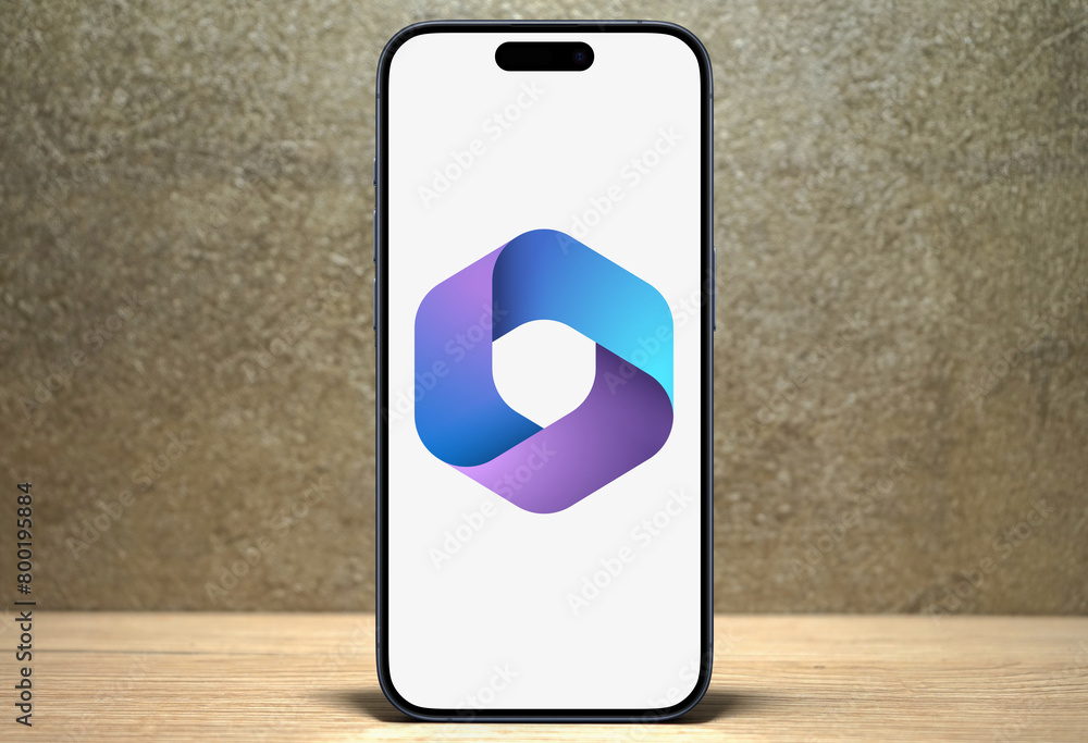 Microsoft 365 Logo is displayed on a modern smartphone standing on a ...