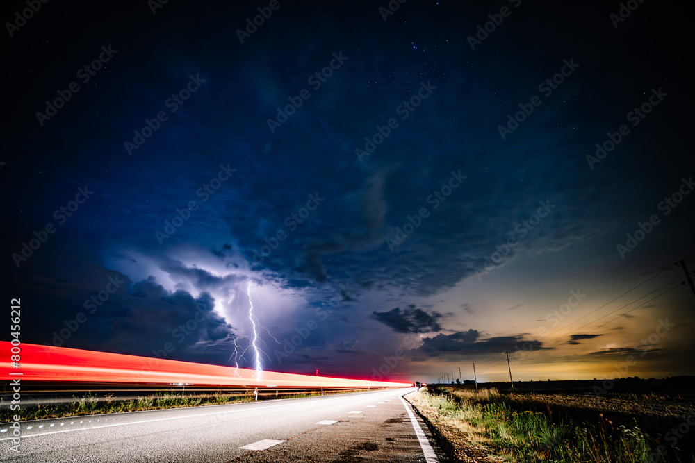 Dobele, Latvia - August 18, 2023 - A starry night sky with clouds, a ...