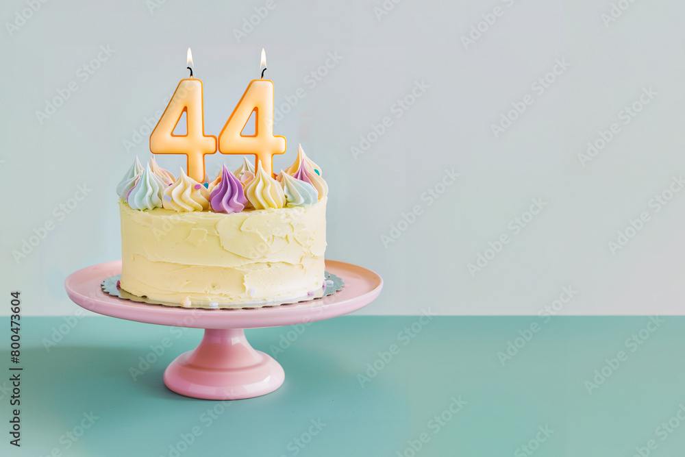 44th birthday cake celebrating 44 years on an isolated, colorful pastel ...