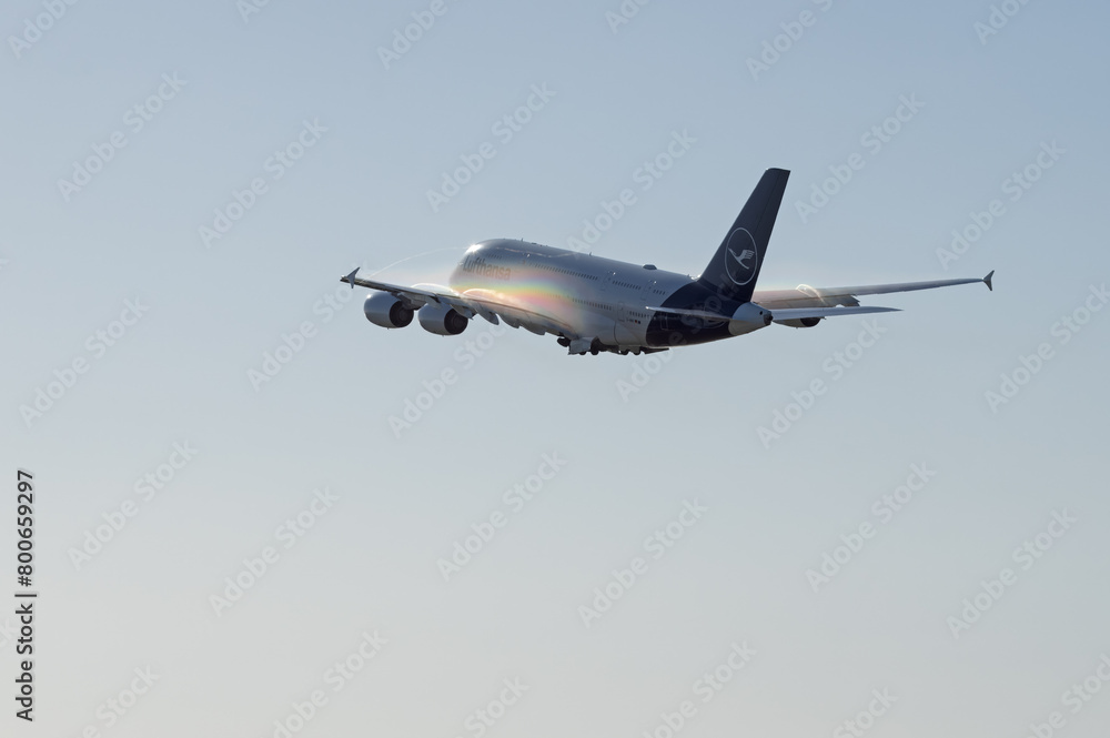 Rainbow effect due to condensation on a Lufthansa Airbus A380 aircraft ...