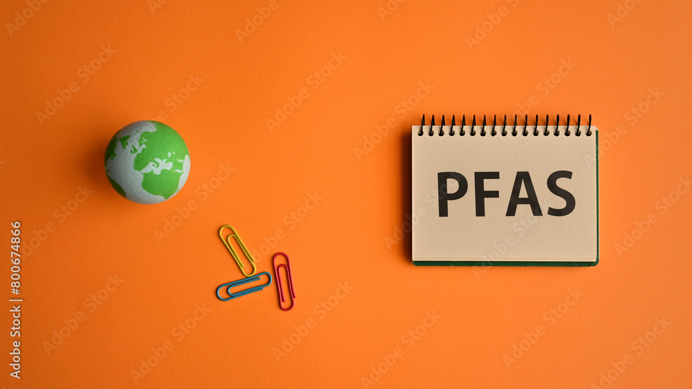 There is notebook with the word PFAS. It is an abbreviation for Per-and ...