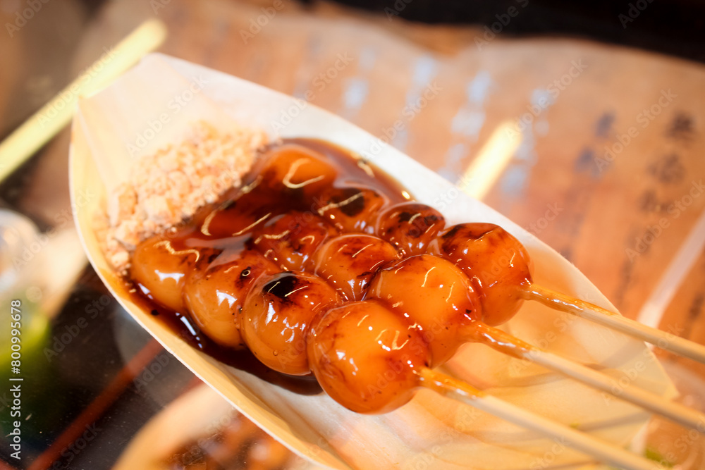 Mitarashi dango Japanese street food with sweet soy sauce Photos ...