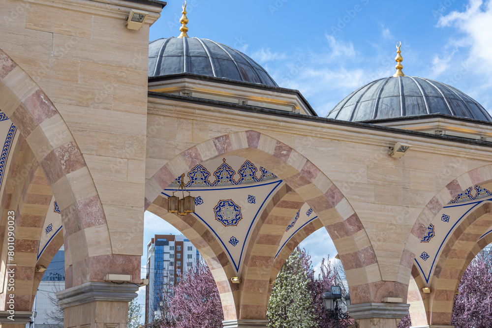 The traditional Chechen ornament "bustam" on the arches of the summer ...
