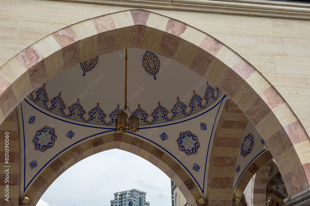 The traditional Chechen ornament "bustam" on the arches of the summer ...