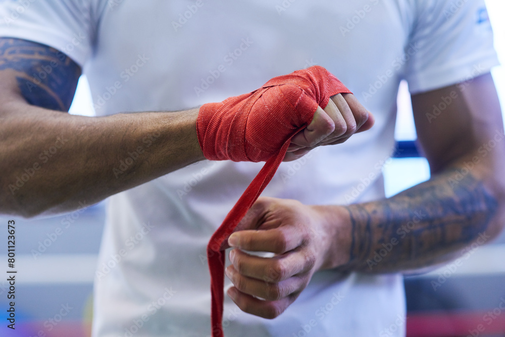 Ring, boxer or man wrapping hands for training, exercising and workout ...