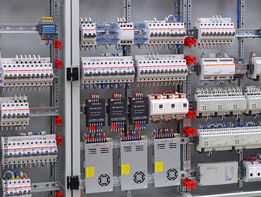 An electric switchboard with modules for protection and control of ...