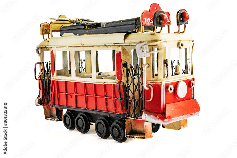 Red vintage tram isolated on white background. A toy replica of a tram ...