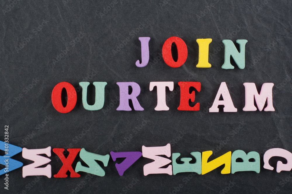 JOIN OUR TEAM word on black board background composed from colorful abc ...
