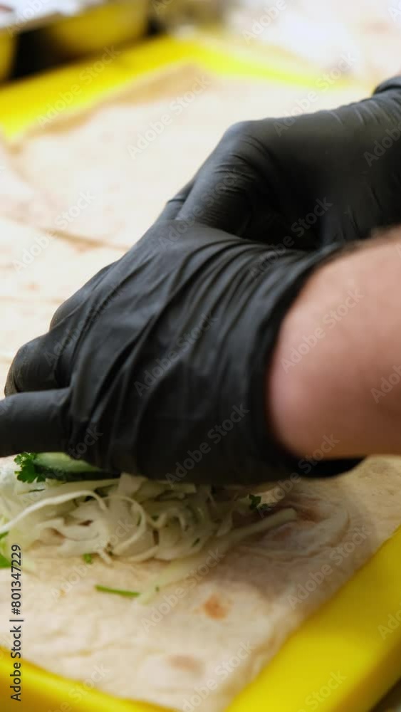cooking shawarma, doner kebab. Delicious fat junk foods served in take ...