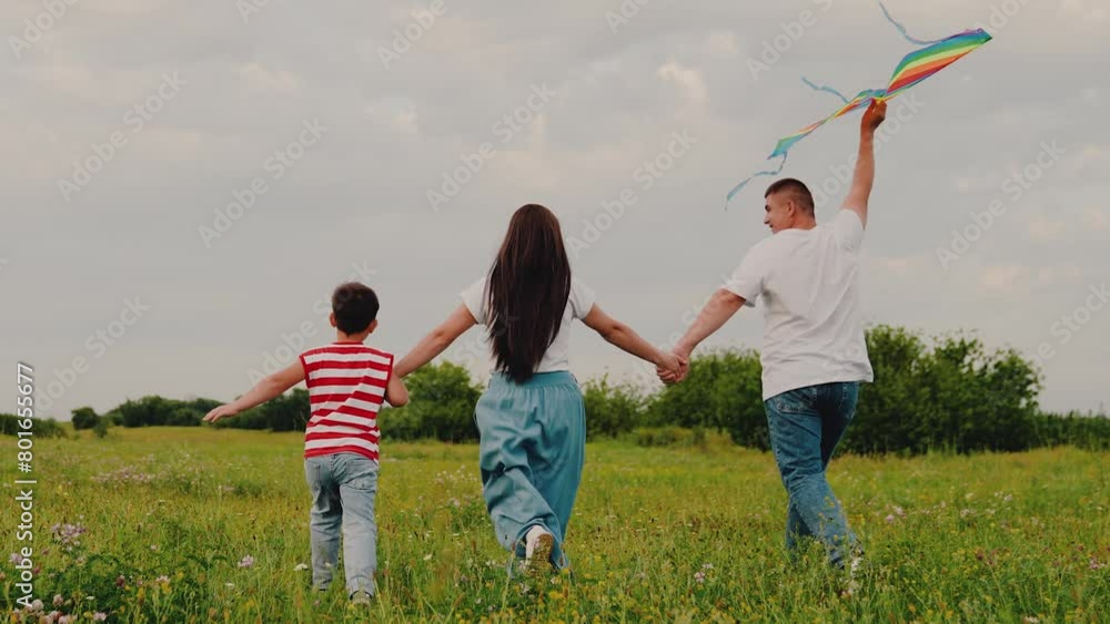 Kid, parents dream to fly. Happy family with kid boy in park playing ...