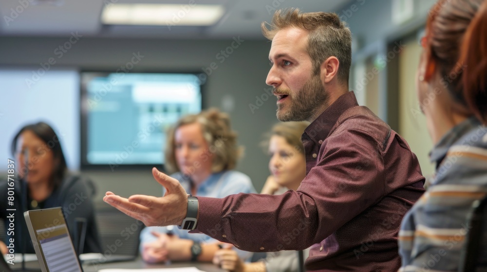 A young professional facilitates an interactive training session in a ...