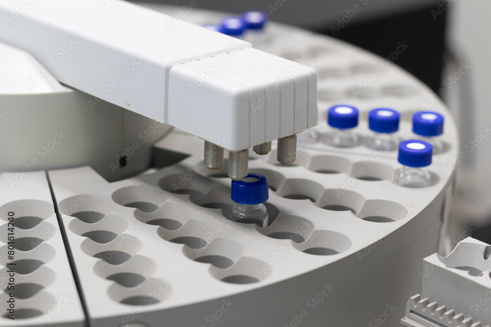 vial on autosampler of gas chromatography instrument in chemistry, gc ...