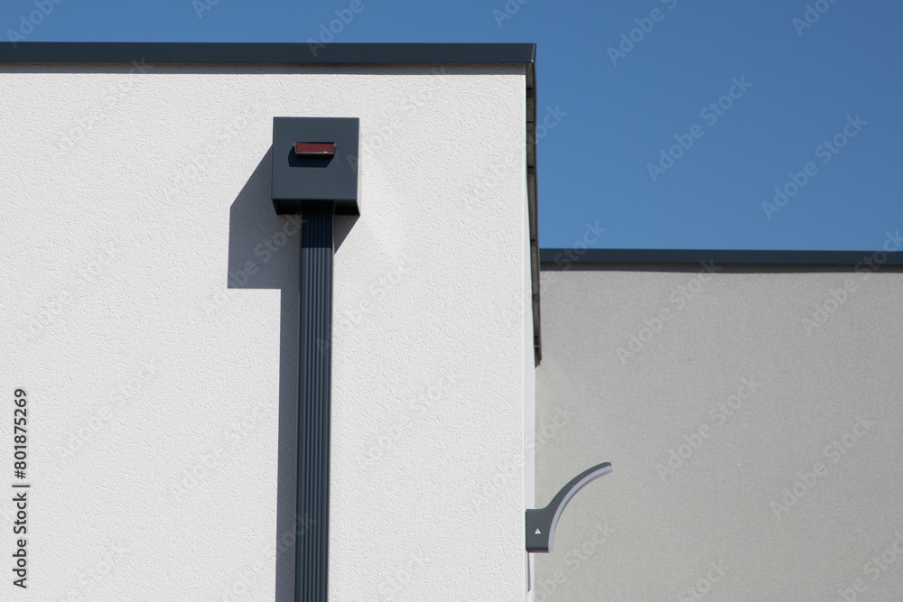 grey gutter guard system roof drip edge on modern home neighborhood ...