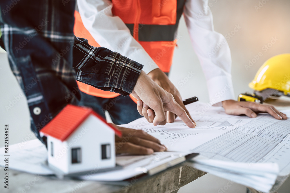 Concept Teamwork of building construction staff. Project engineer ...