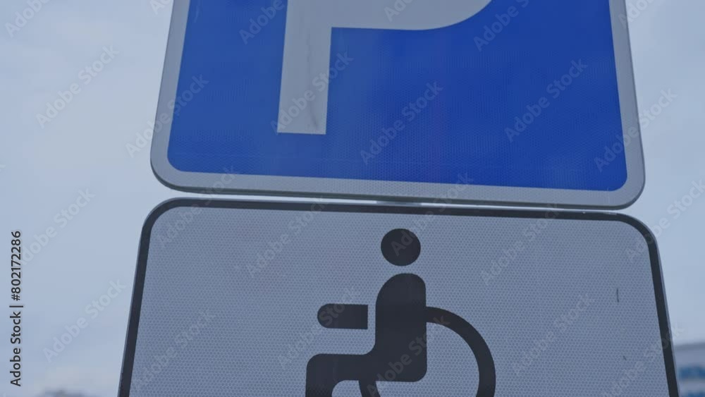 Road sign Parking for people with disabilities against cloudy sky. City ...
