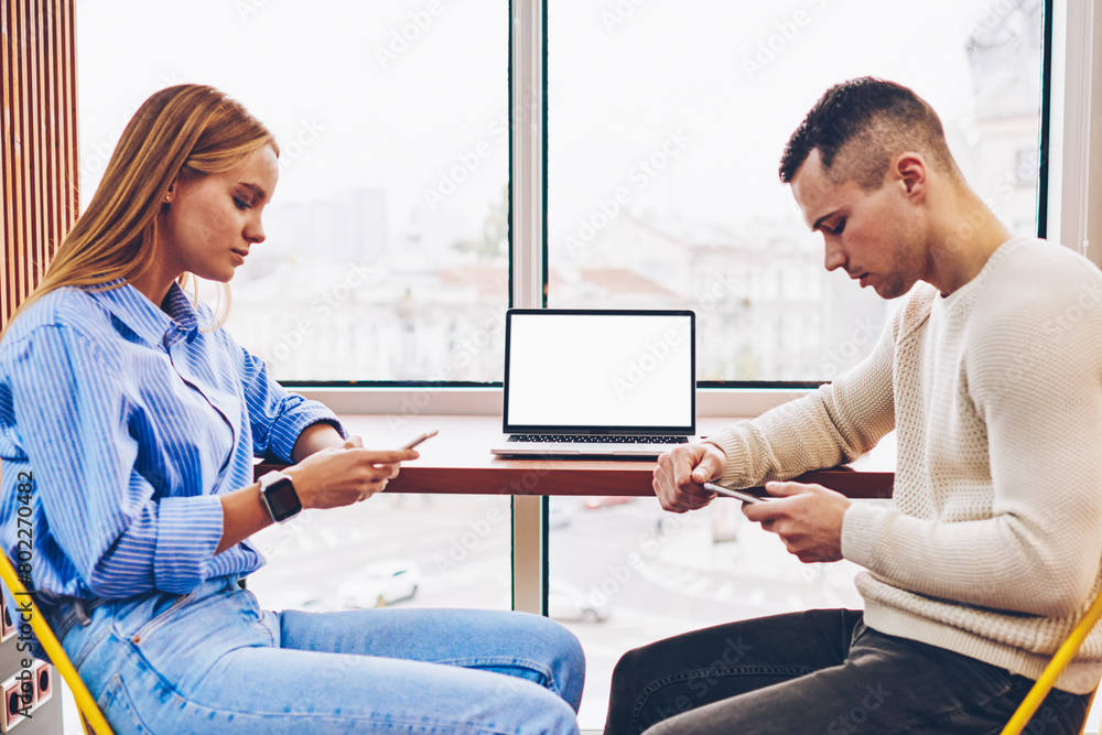 Students concentrated on social networks chatting ignoring ...