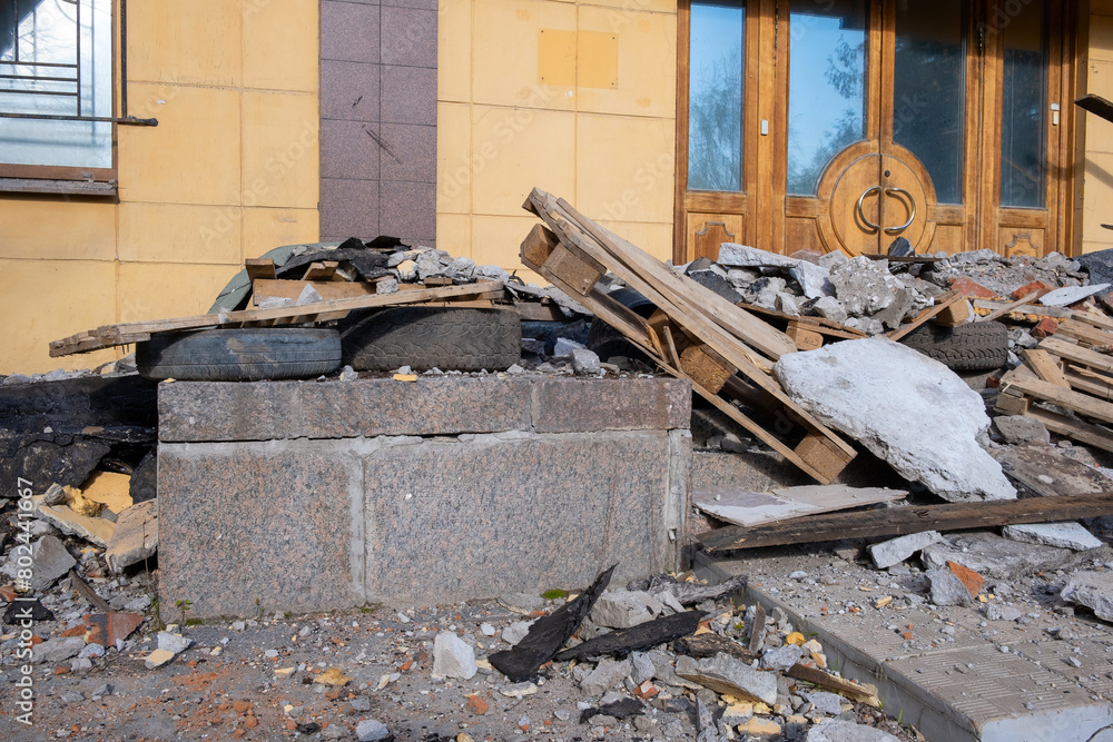 Construction waste after dismantling the ceilings and walls of a ...