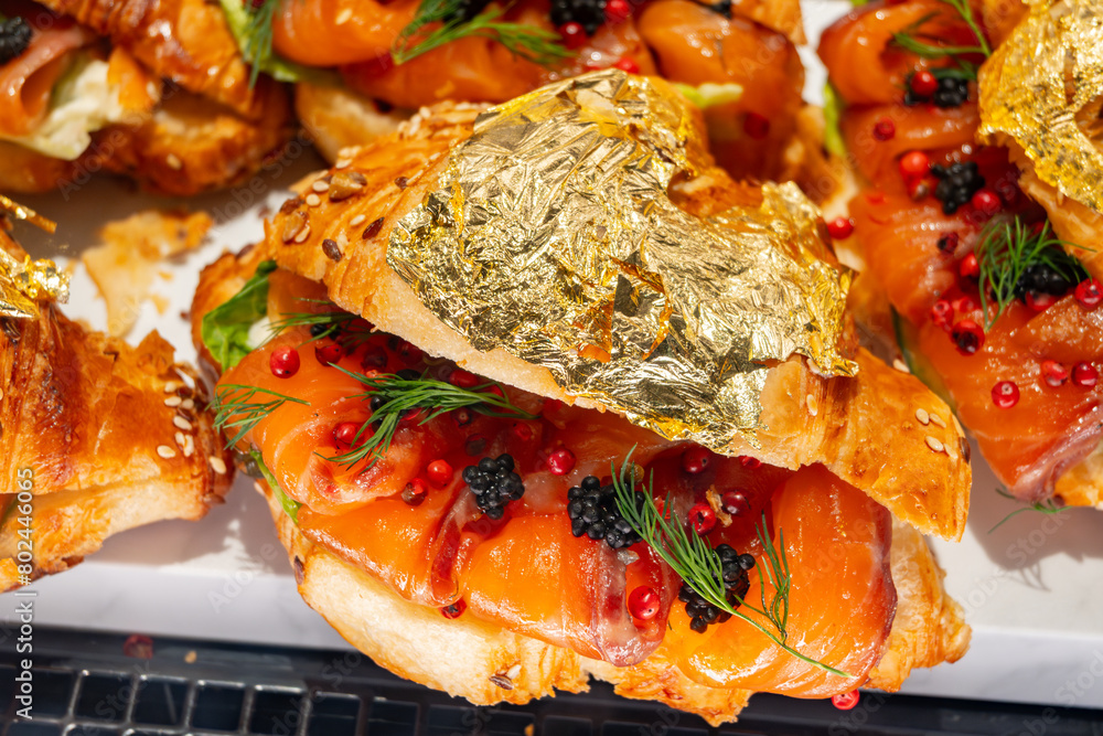 Butter puff croissants on display in artisanal bakery in London, filled ...