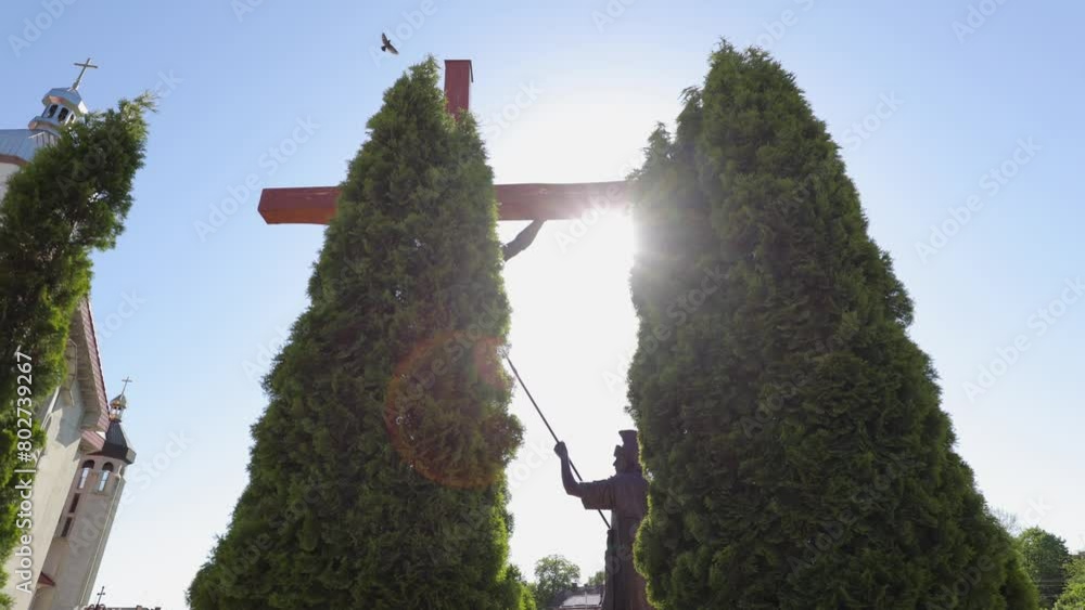 Crucifixion of Jesus Christ against the background of the blue sky. Way ...