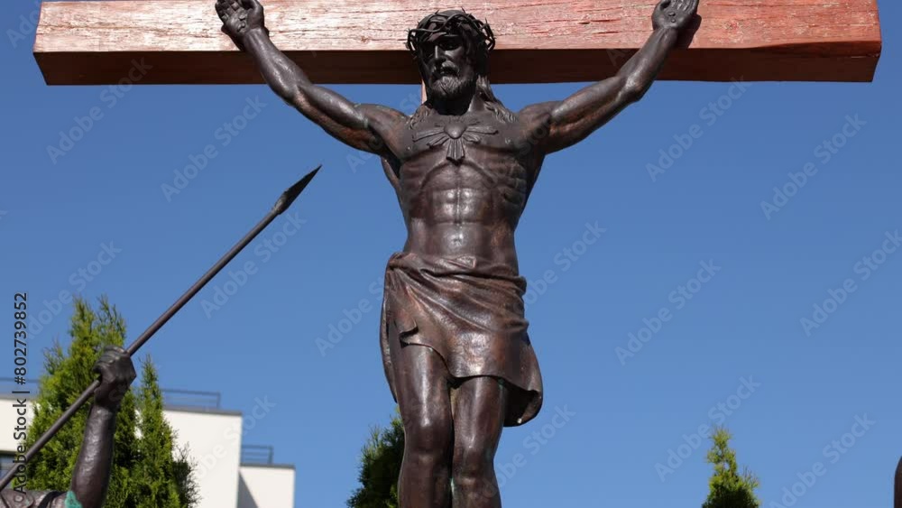 Crucifixion of Jesus Christ against the background of the blue sky. Way ...