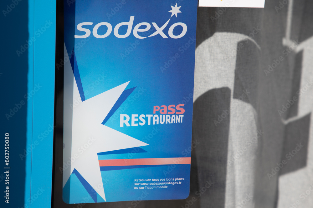 Sodexo cheque restaurant brand logo and text sign pub bar door windows ...