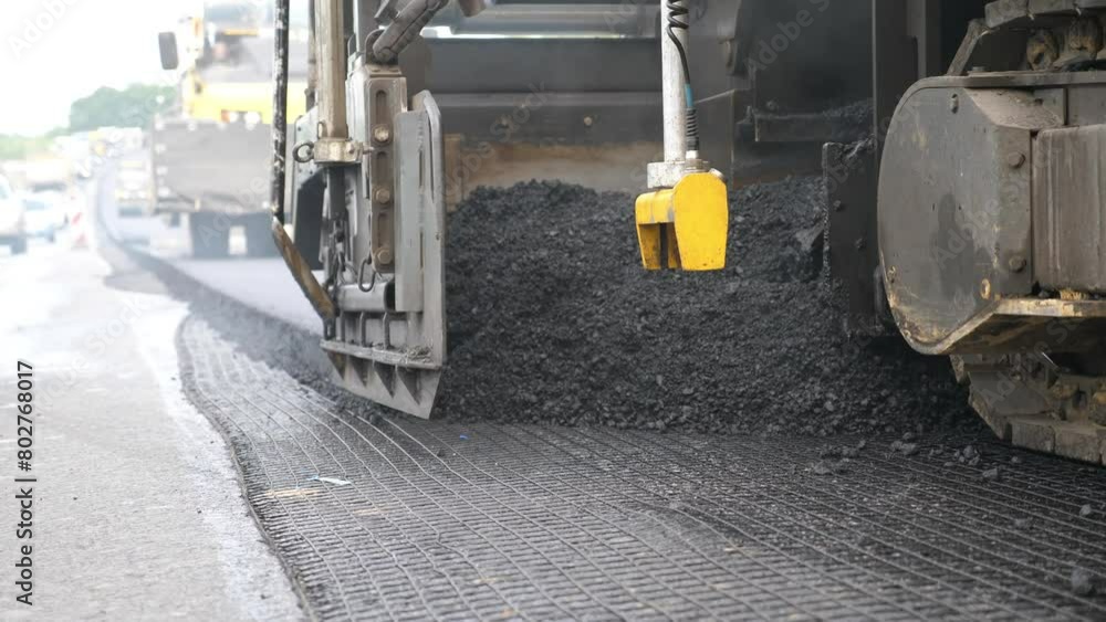 Special machinery making road in countryside area. Compactor ...