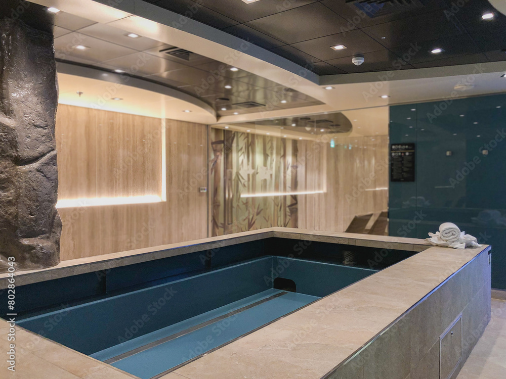 Indoor swimmingpool with hot tub whirlpool inside thermal suite in spa ...