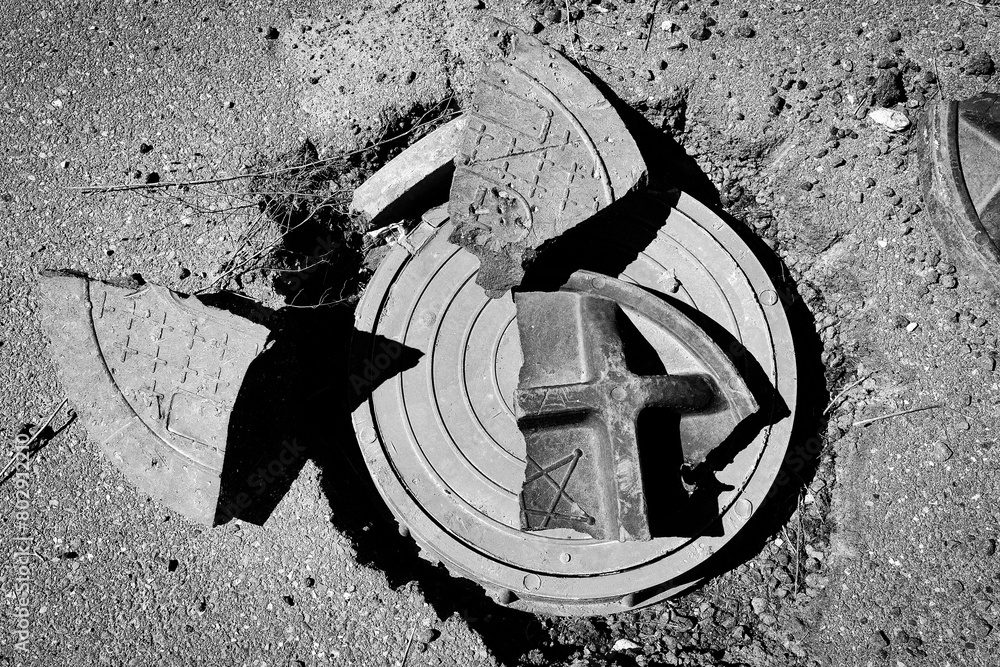 Manhole cover. Abstract grunge background. Black and white photo ...